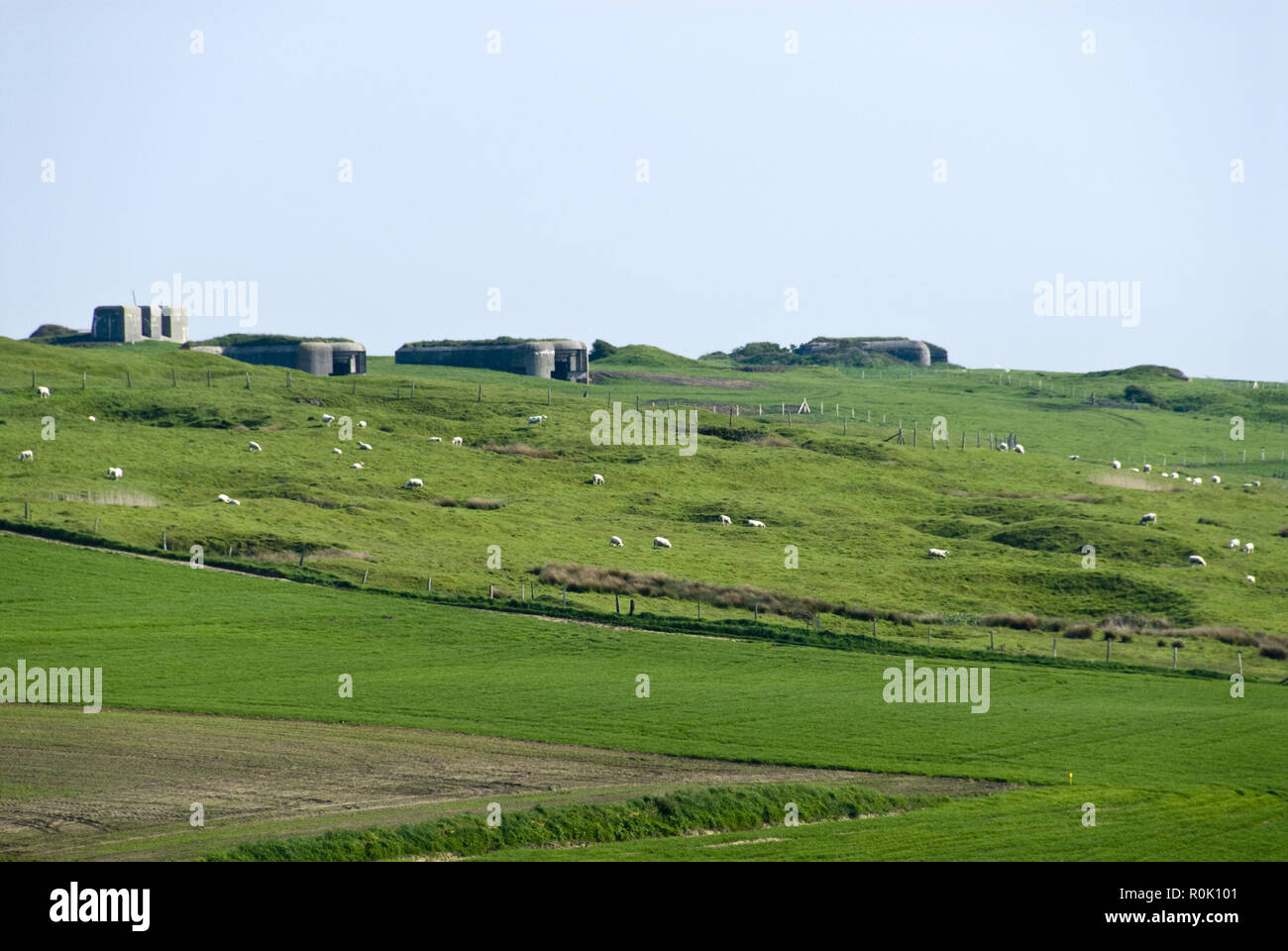 The remains of World War Two German artillery batteries stand along the ...
