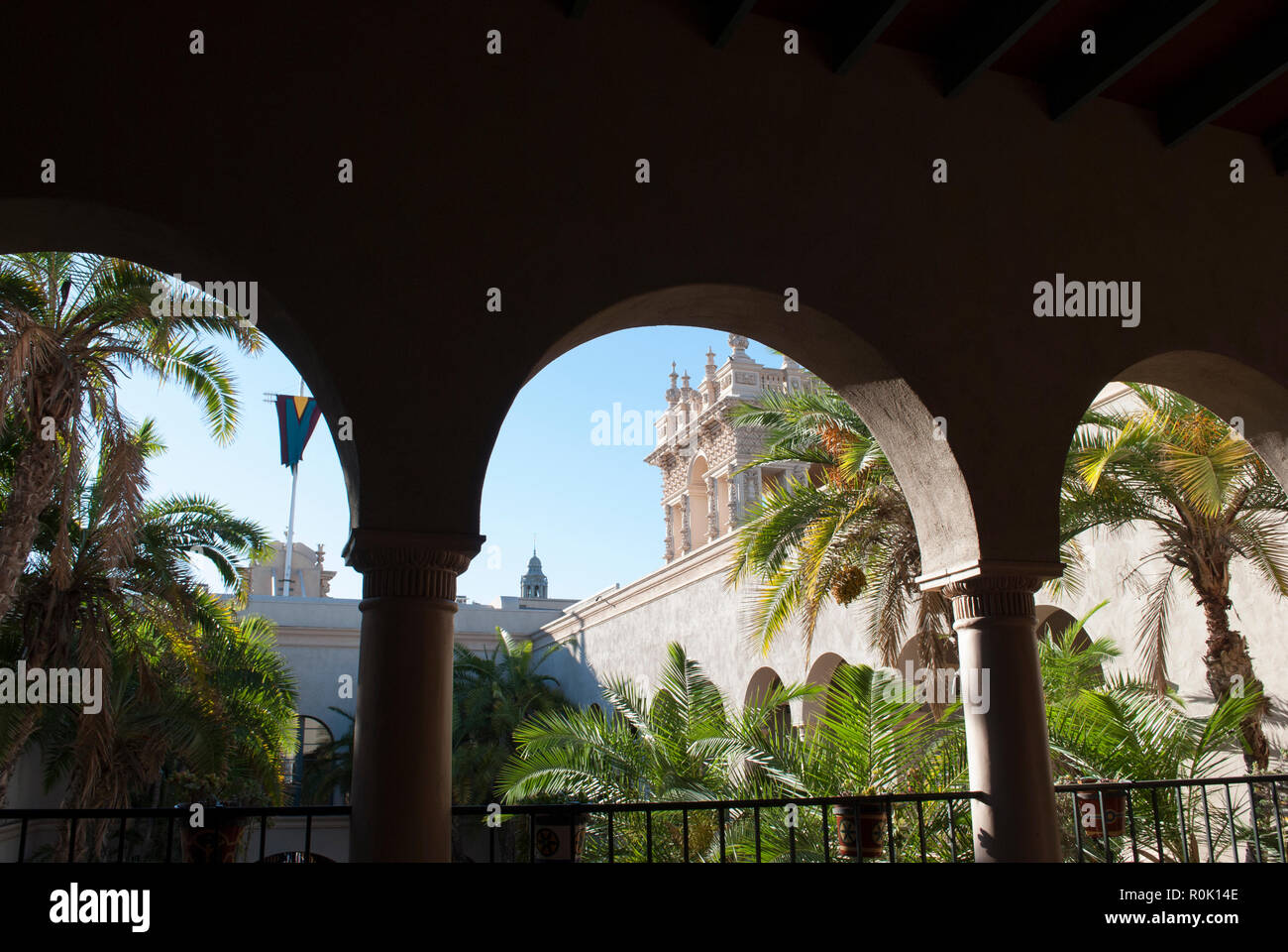View on the palm garden and palace tower through the arches of the ...