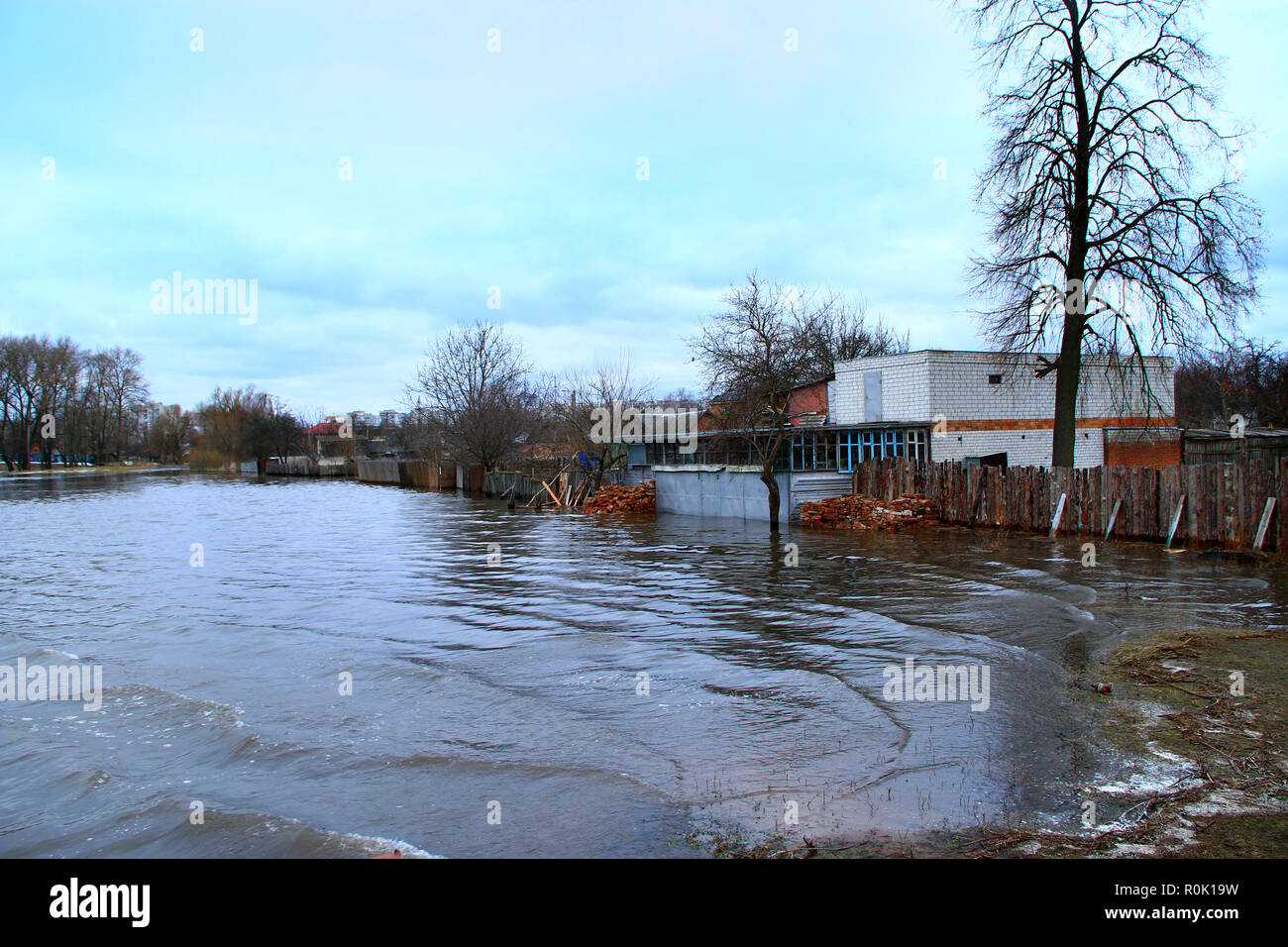 Flooding of river in spring in town during melting of snow. Flooding ...
