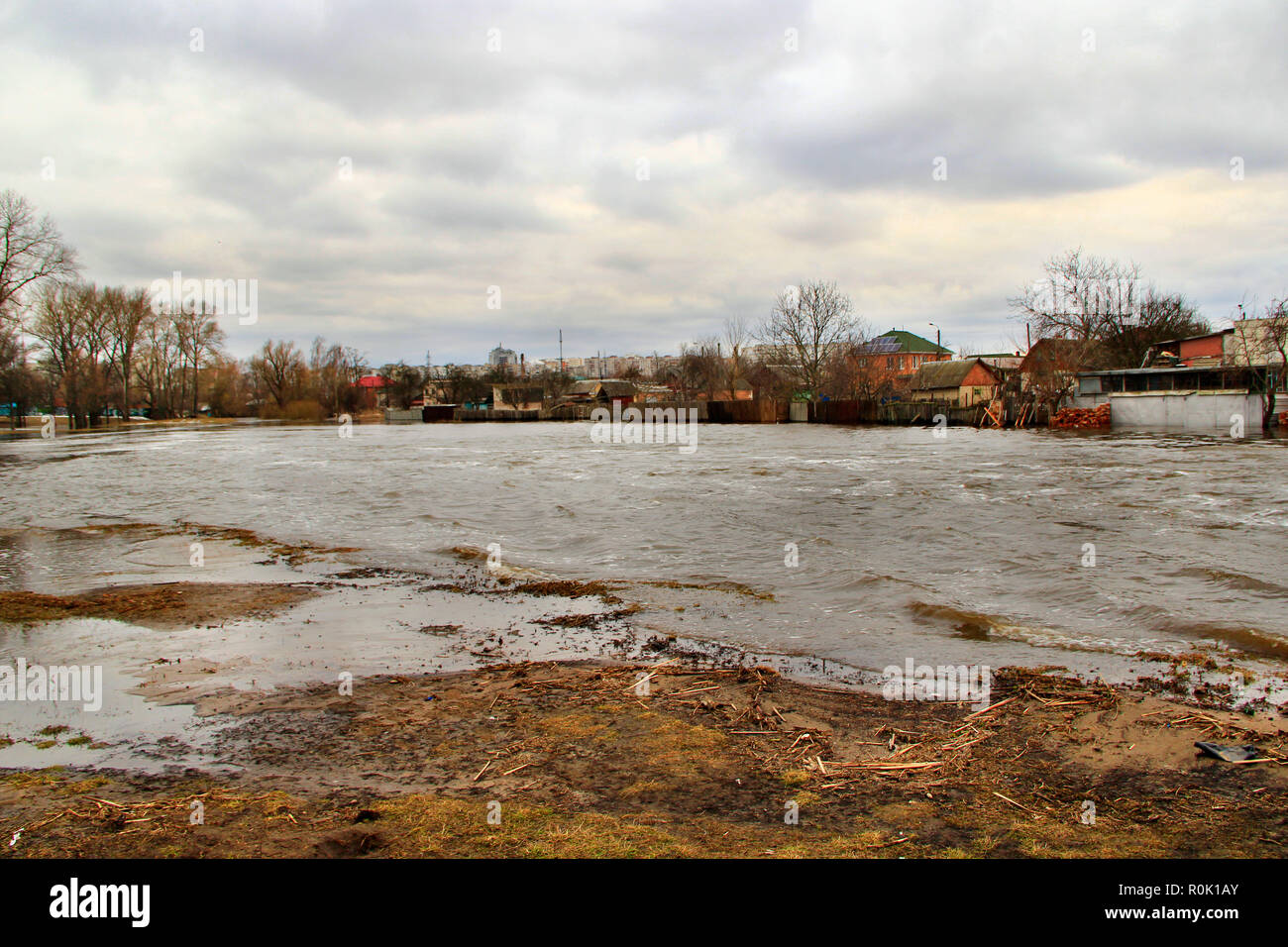 Flooding of river in spring in town during melting of snow. Flooding ...