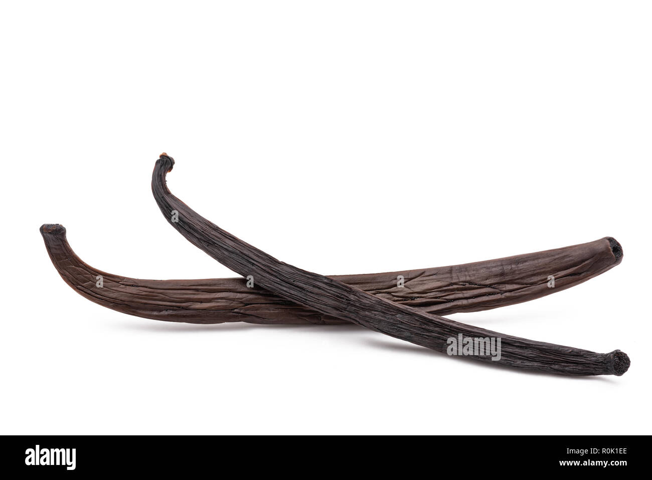 Vanilla sticks isolated on white background Stock Photo - Alamy