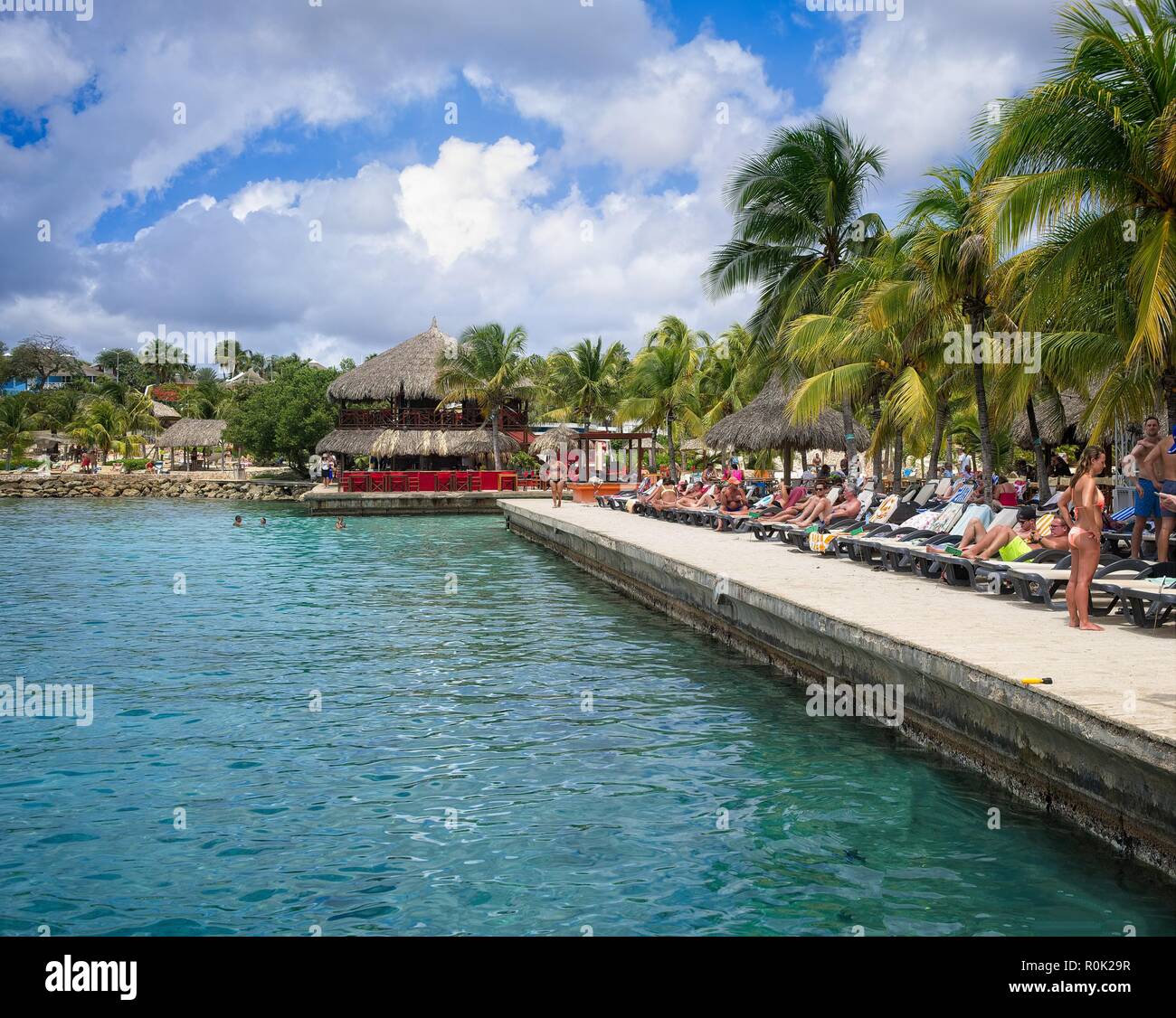 Vacationers relaxing at the JanThiel resort on the island of Curacao in ...