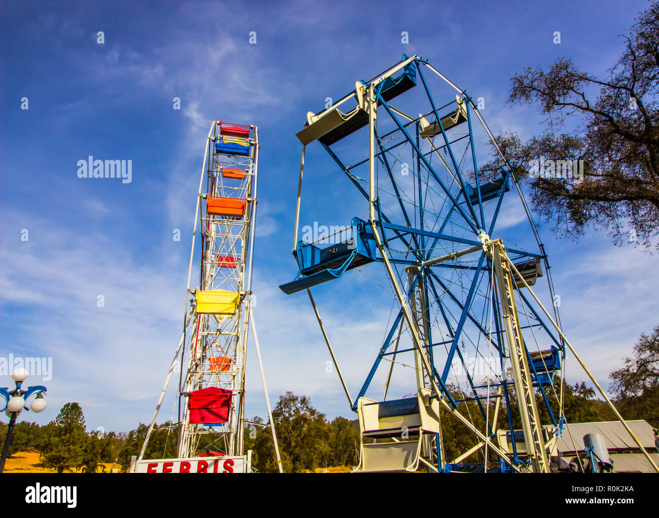 Two Old Ferris Wheels In Storage Stock Photo - Alamy