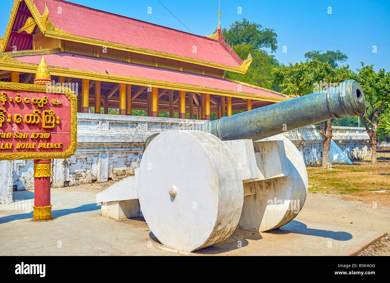 MANDALAY, MYANMAR - FEBRUARY 23, 2018: The cannon on the stone basement ...