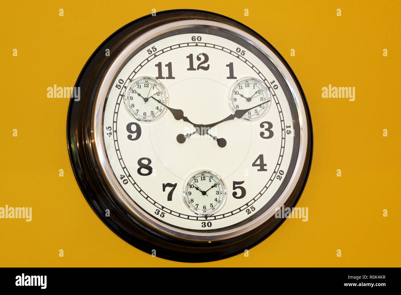 Business clock with different time zone at wall Stock Photo - Alamy