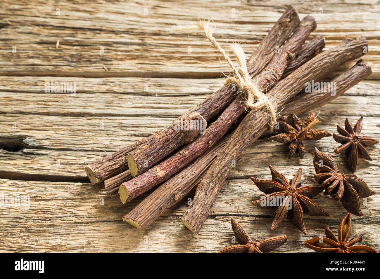 licorice root and anise on the table - Glycyrrhiza glabra Stock Photo ...
