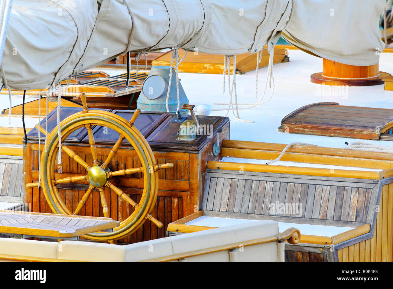 Old sail ship bridge with wooden wheel Stock Photo - Alamy