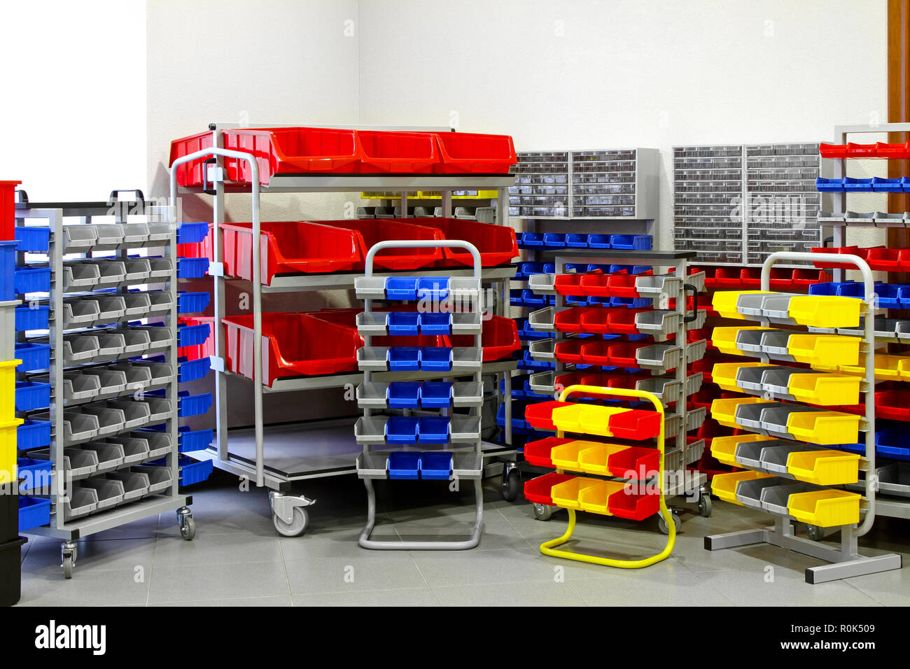 Colorful shelves and racks for warehouse storage Stock Photo - Alamy
