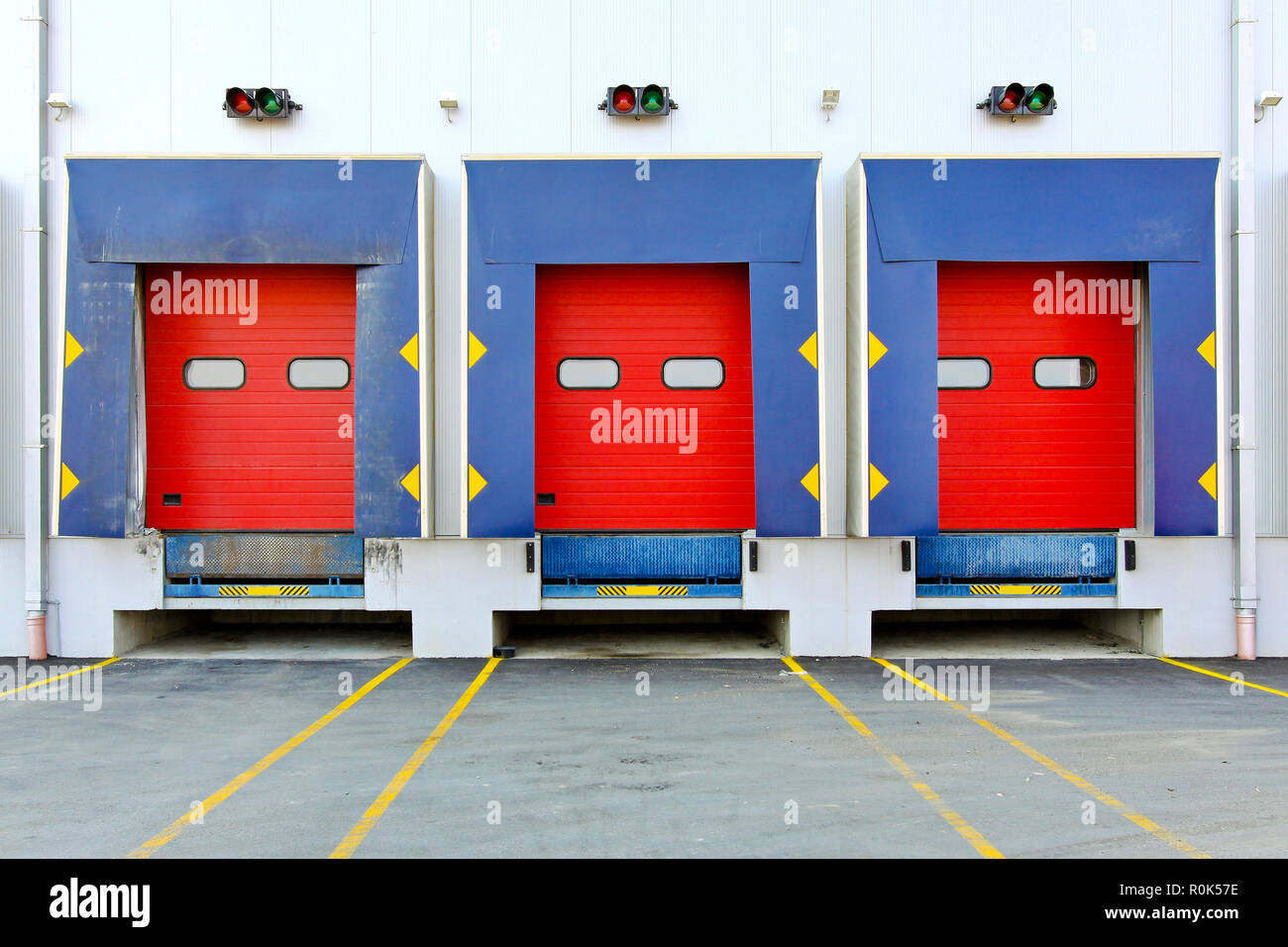 Loading dock cargo doors at big warehouse Stock Photo - Alamy
