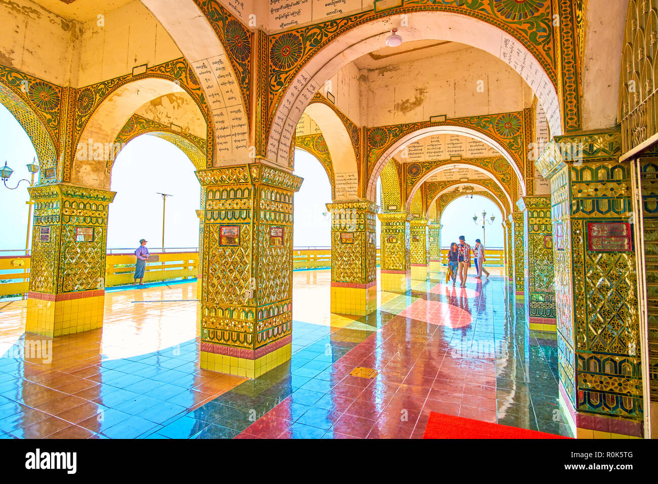 MANDALAY, MYANMAR - FEBRUARY 23, 2018: The arched gallery of the Su ...