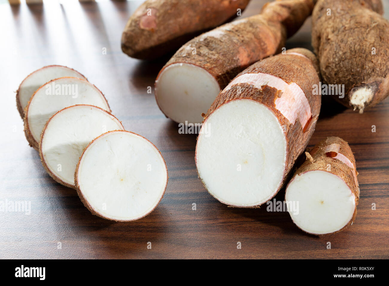 cassava slices on the table Stock Photo - Alamy