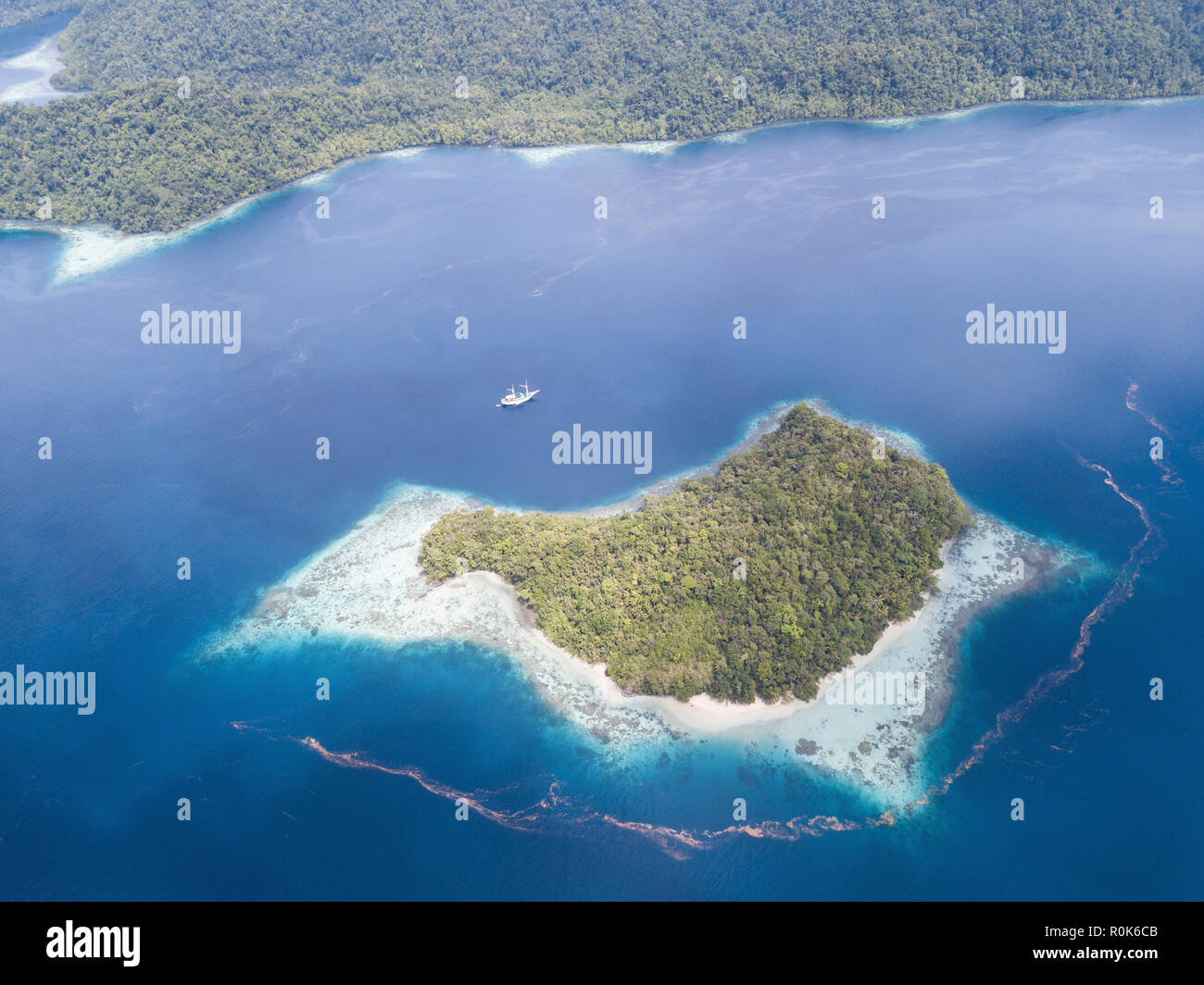 The beautiful islands near Batanta in northern Raja Ampat, Indonesia ...