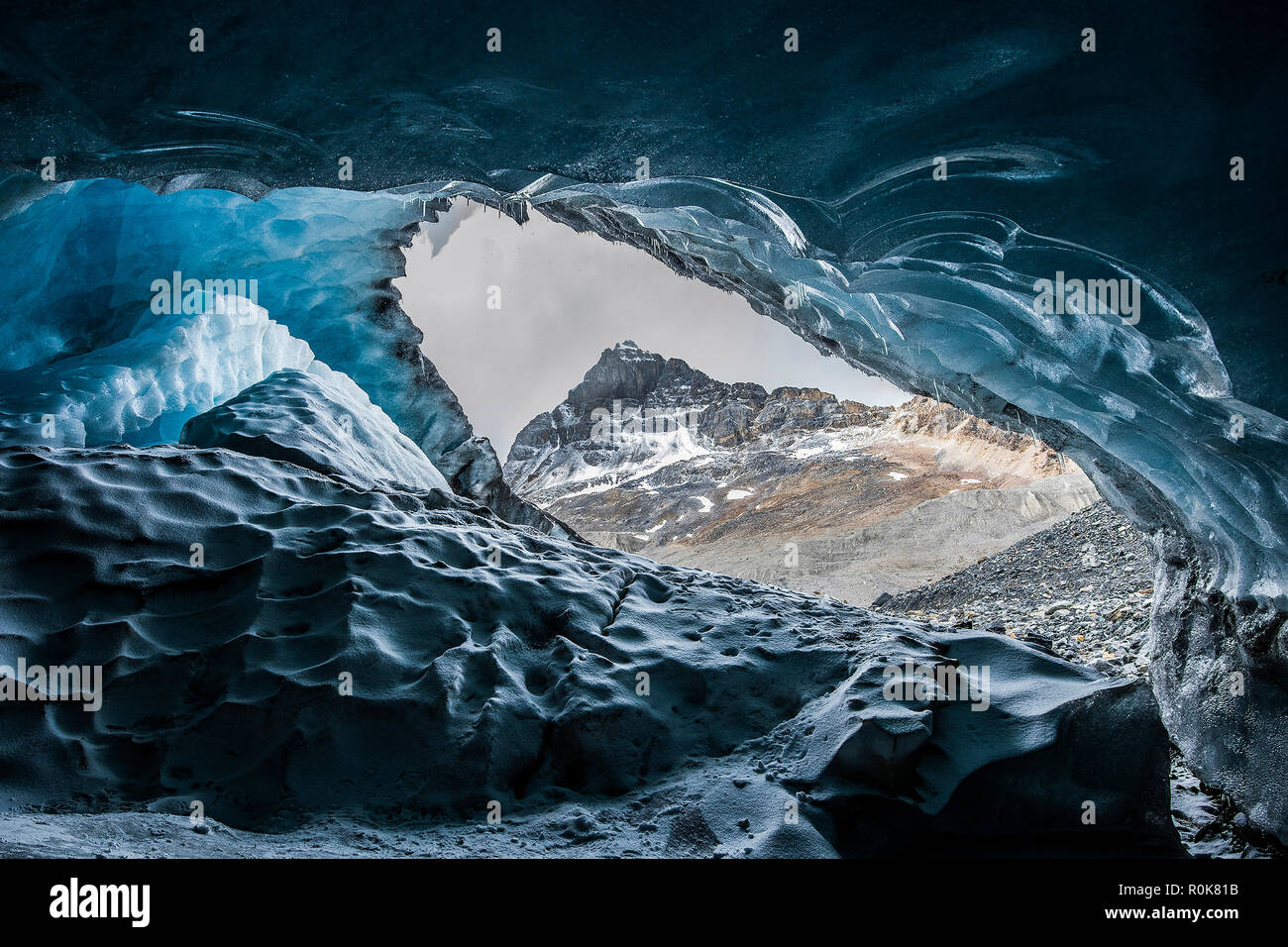 View looking out from inside a glacier in Jasper, Canada Stock Photo ...