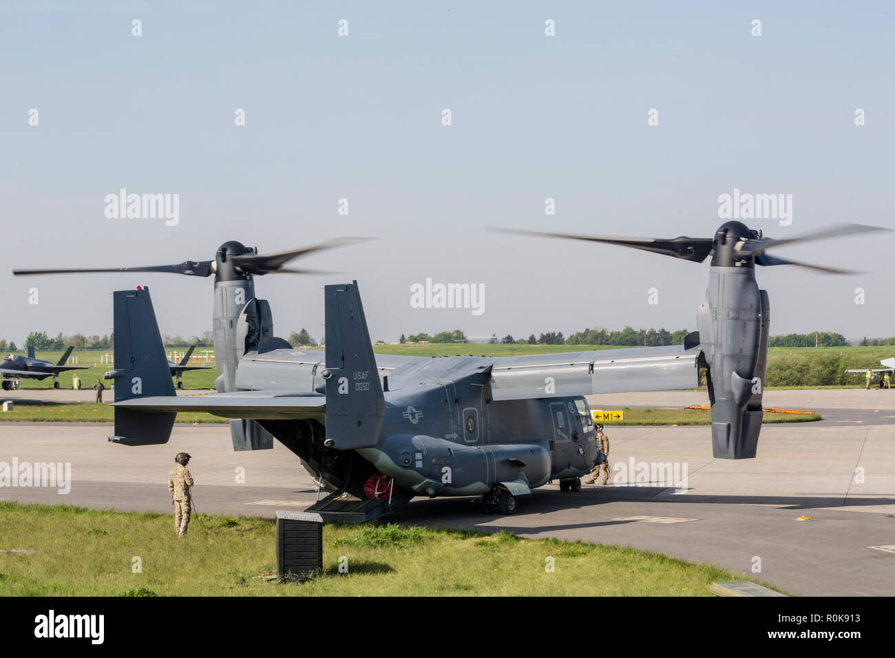 U.S. Air Force CV-22B Osprey tiltrotor aircraft preparing to taxi Stock ...