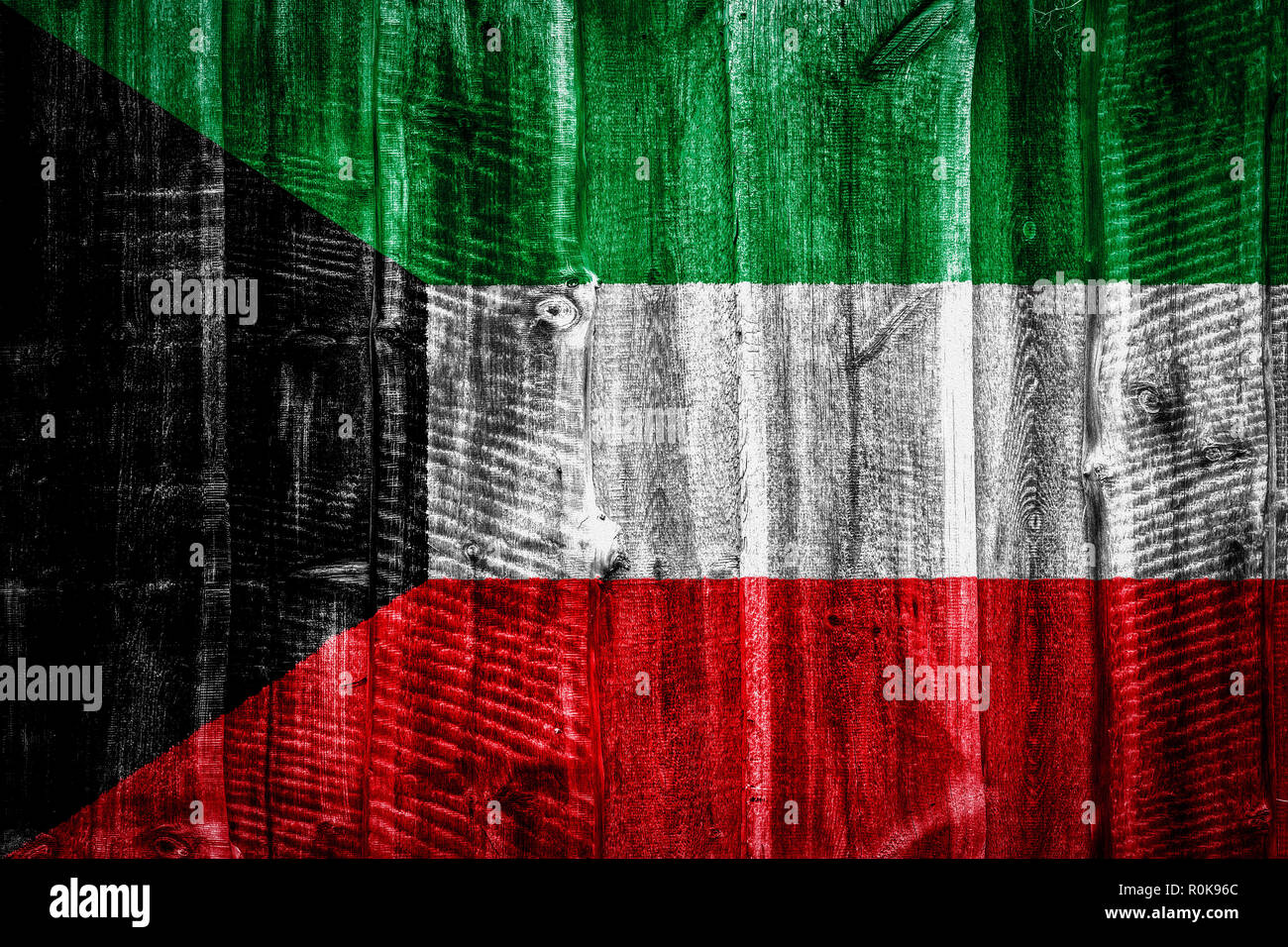 National flag of Kuwait on textured wooden background, fence or wall ...