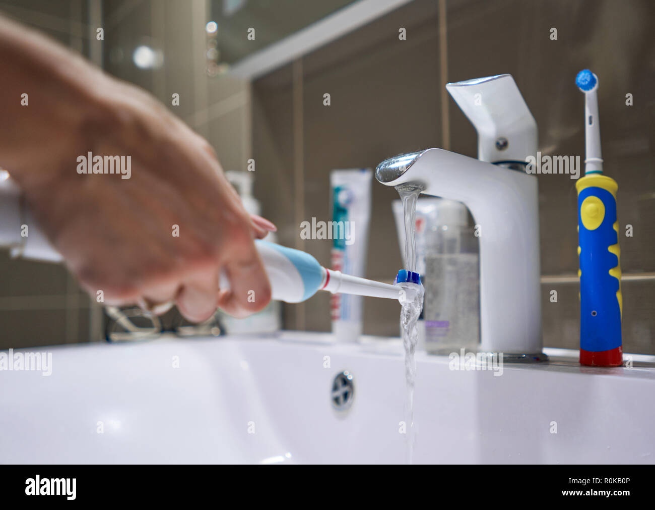 Tube in hand hi-res stock photography and images - Alamy