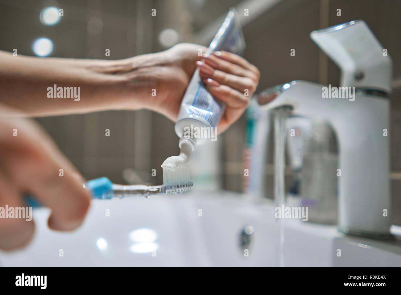 Dentist hand toothbrush hi-res stock photography and images - Alamy