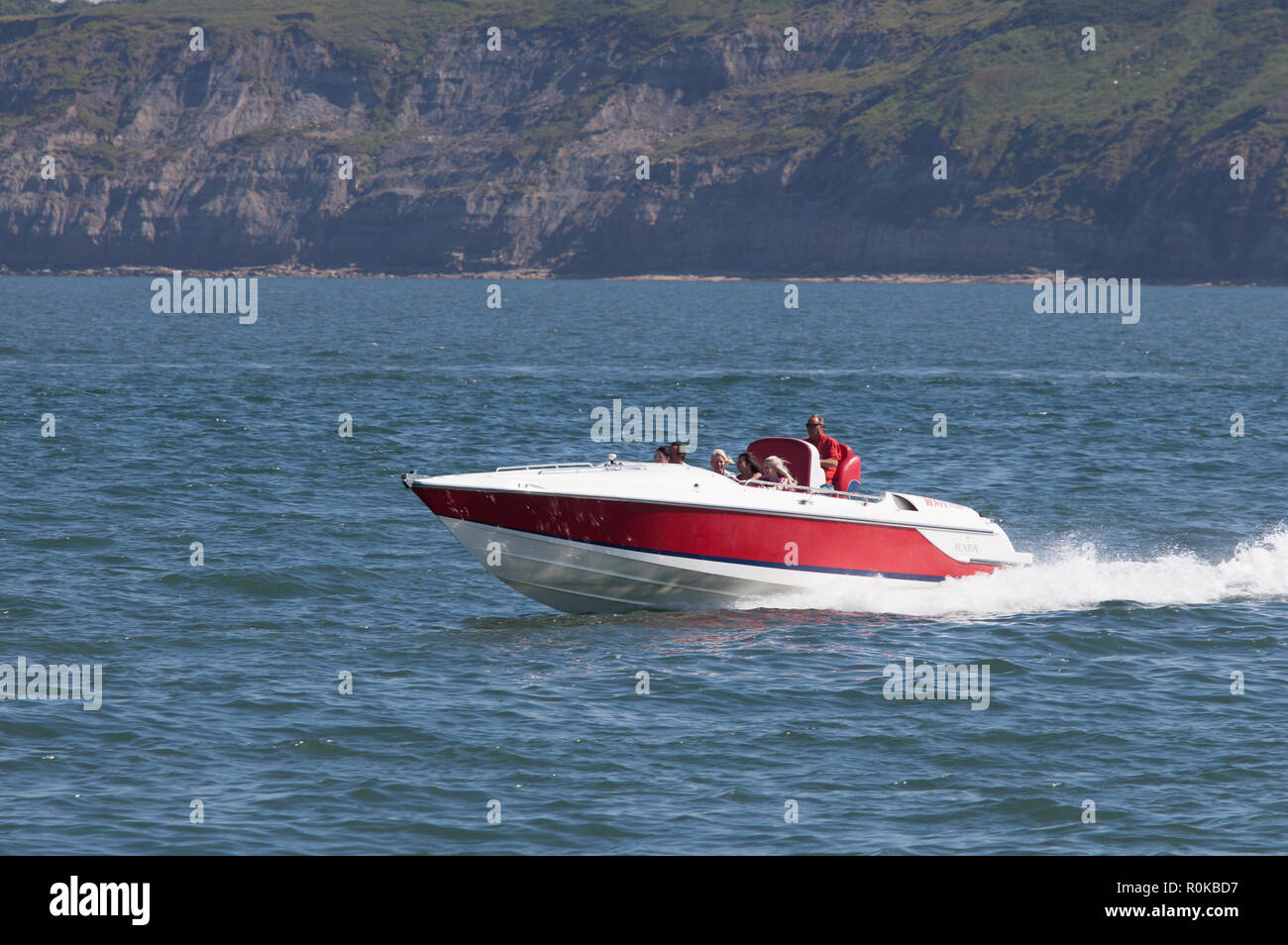 A speedboat giving visitors a trip around the bay at Scarborough in ...