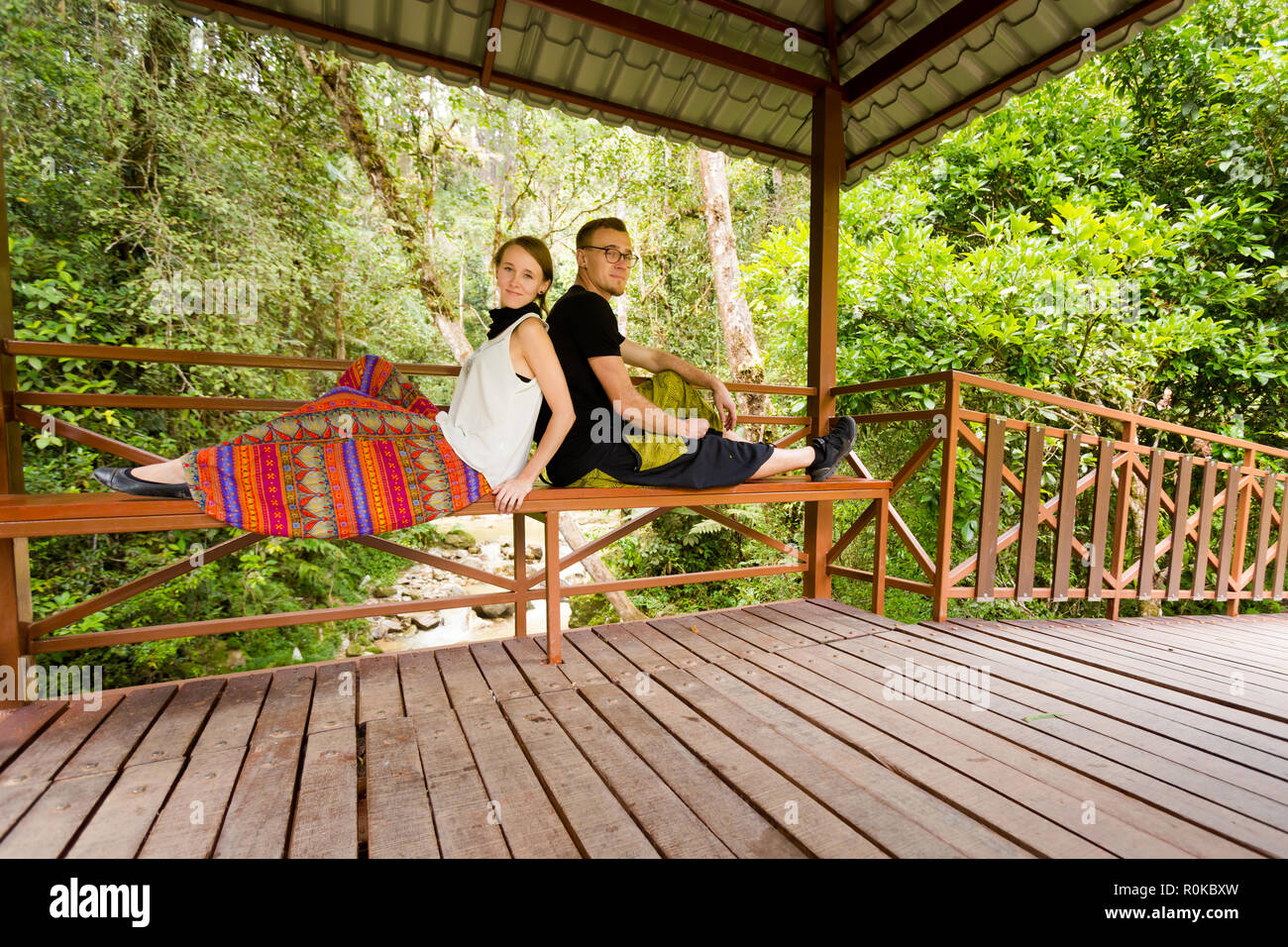 Beautiful landscape with young couple of tourists taken during trekking ...