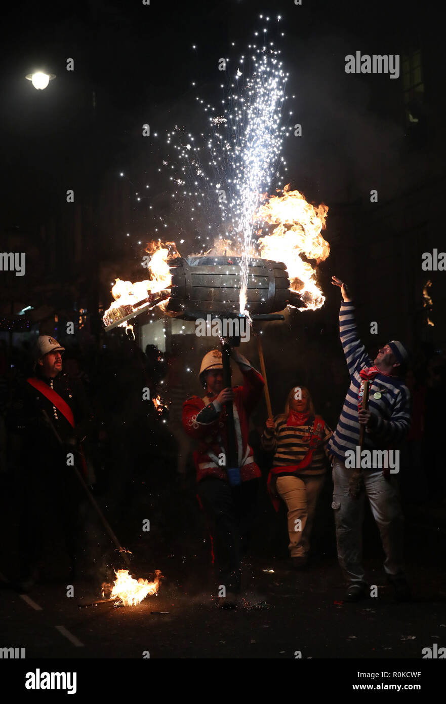Participants parade through the town of Lewes in East Sussex during an ...
