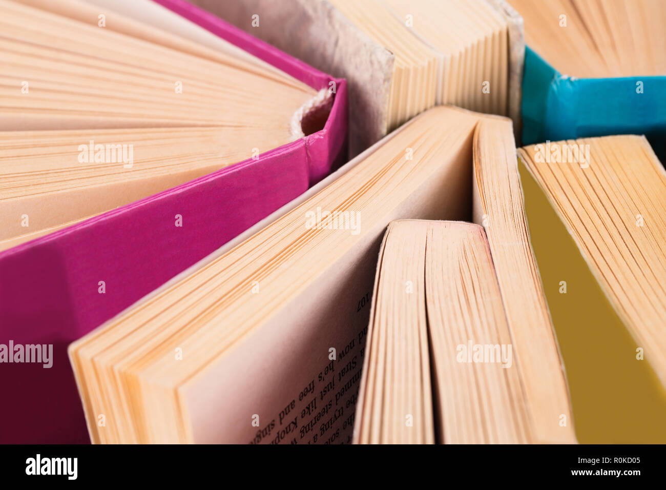 Opened books close up picture Stock Photo - Alamy