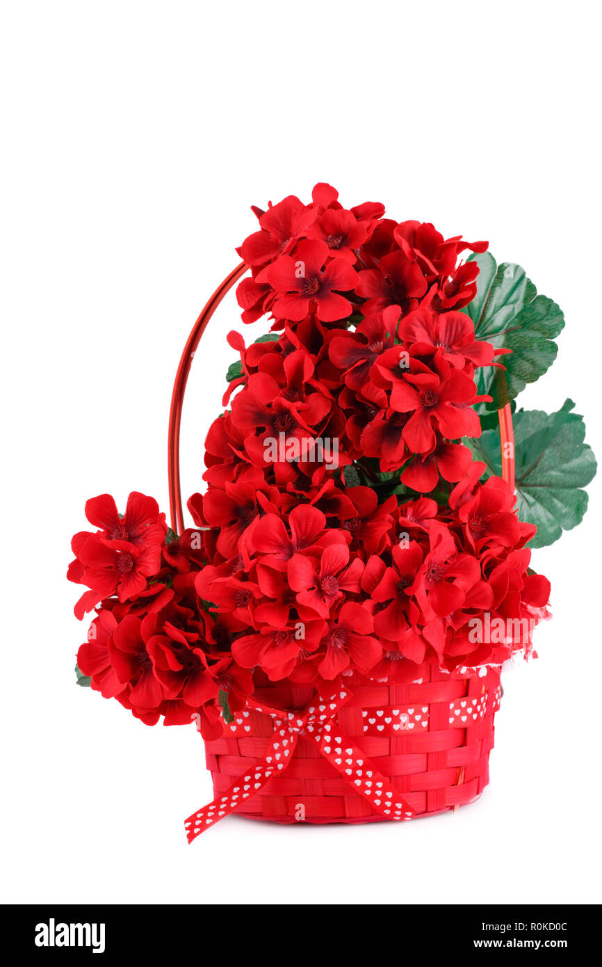 Red fabric flowers in wicker basket isolated on white background Stock ...