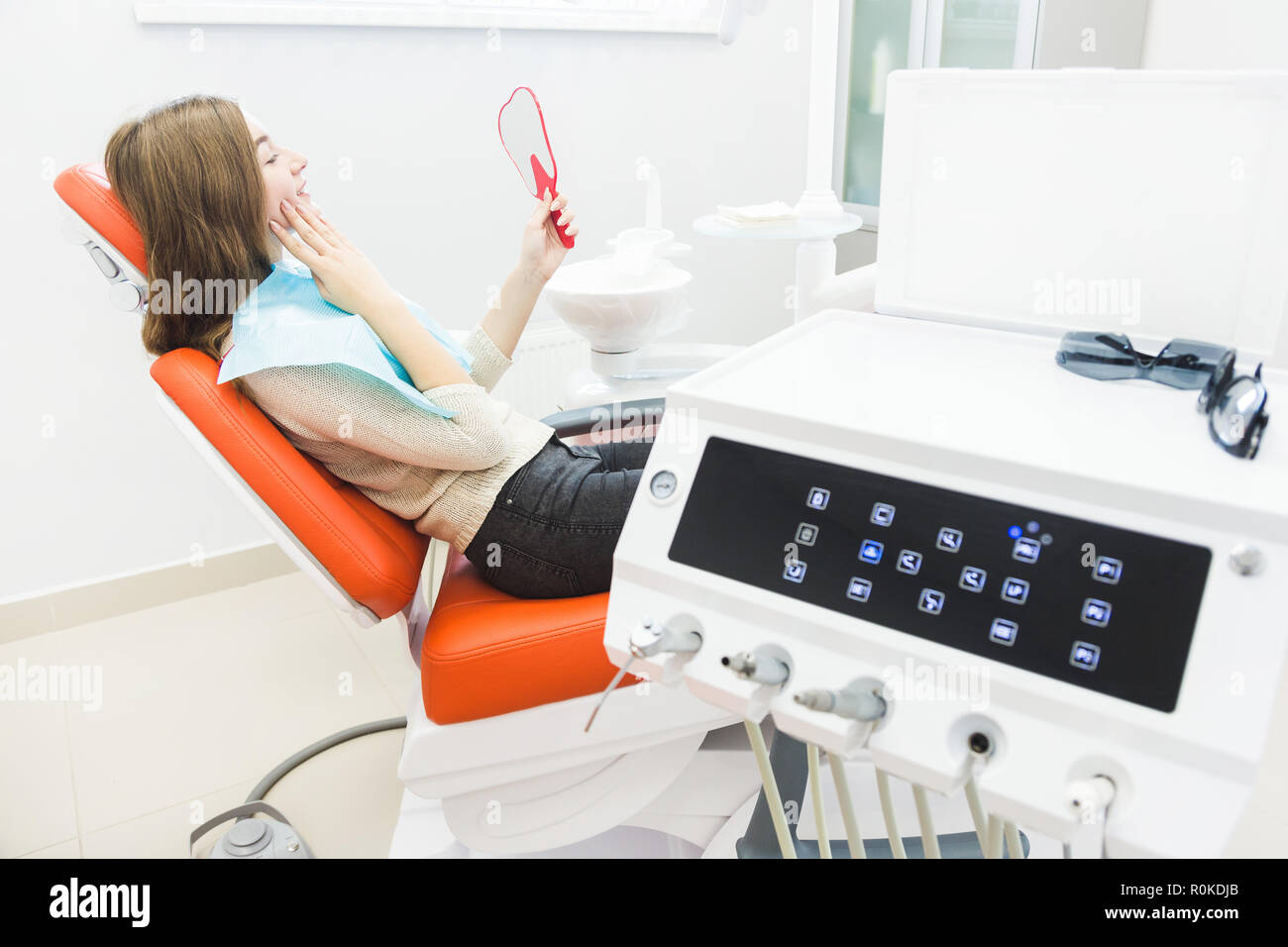 Dental clinic. Reception, examination of the patient. Teeth care. Young ...