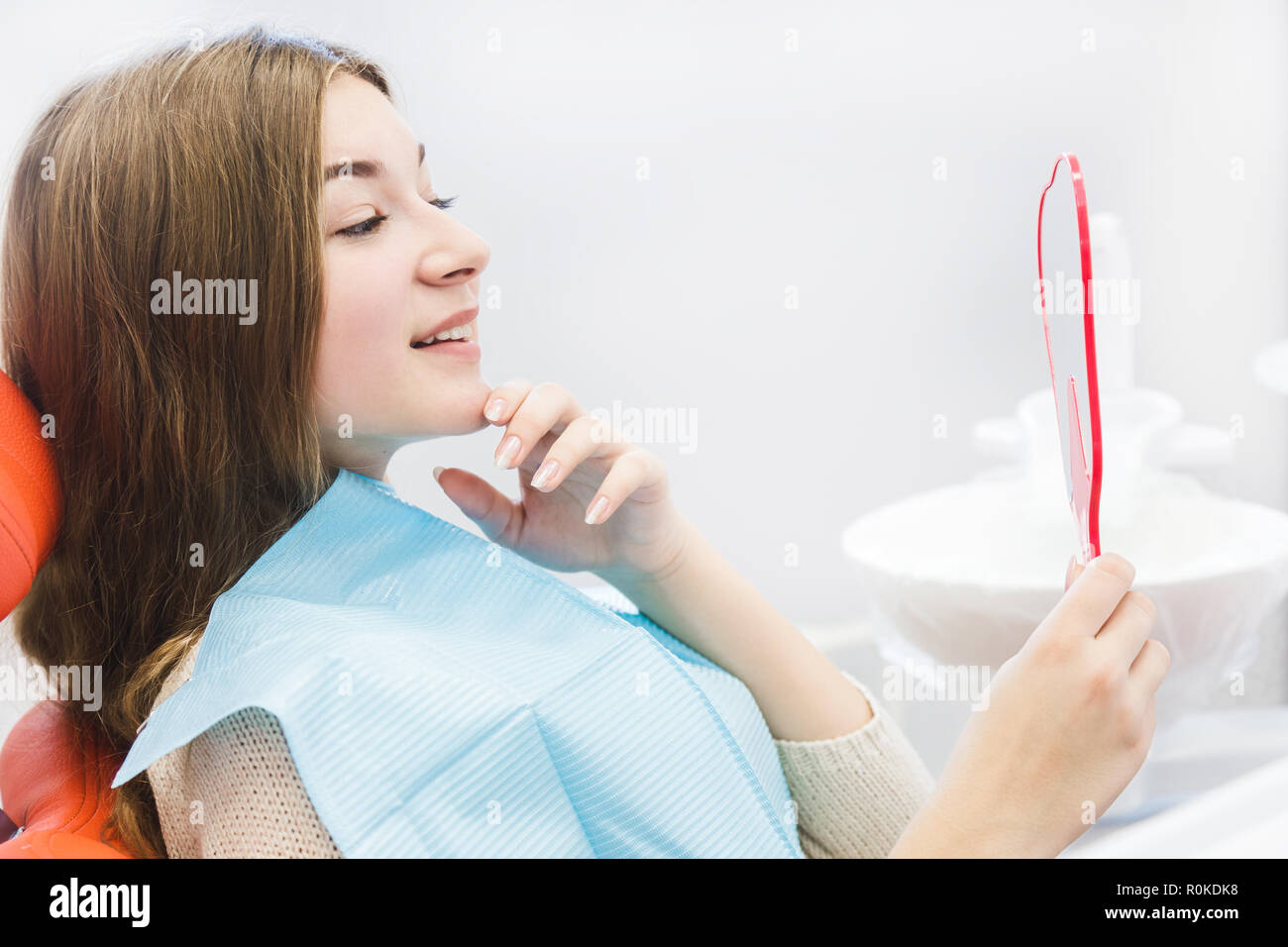 Dental clinic. Reception, examination of the patient. Teeth care. Young ...