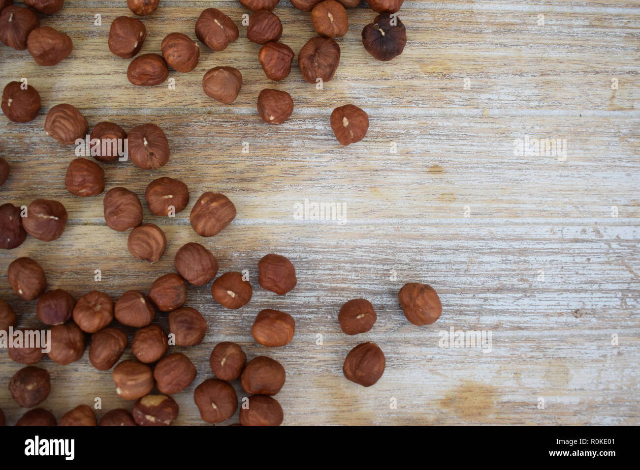 tree nuts in a glass jar isolated on white background Stock Photo - Alamy
