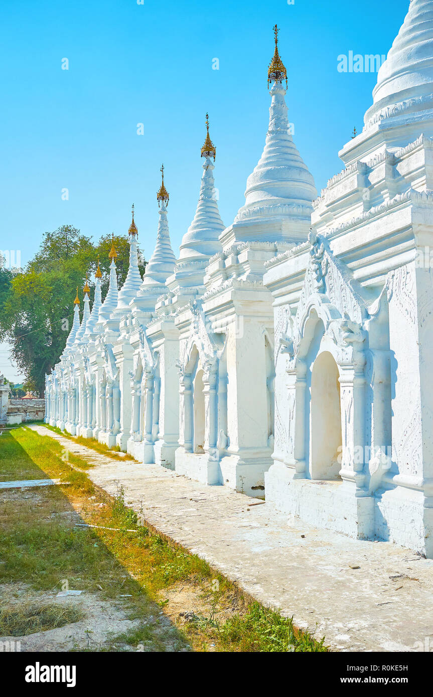 The Kuthodaw Pagoda boasts numerous white stupas with Trapitaka texts ...