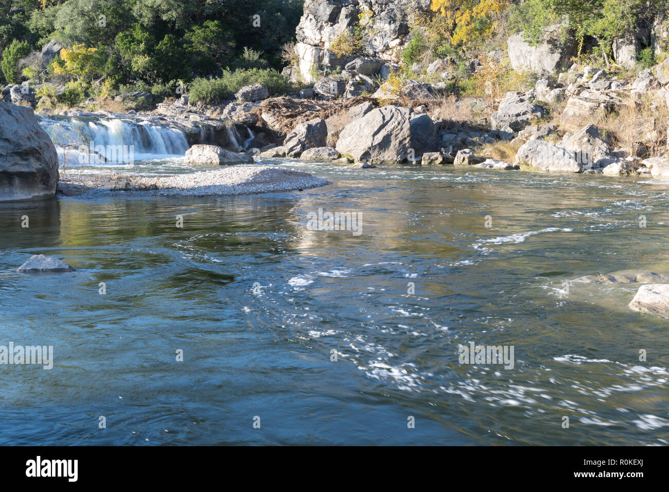 A beautiful section of deep green water and falls at the Pedernales ...