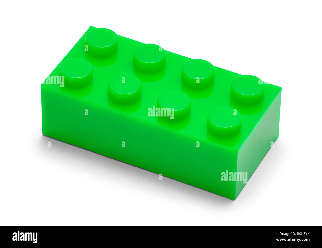 Single Green Plastic Brick on a White Background Stock Photo - Alamy
