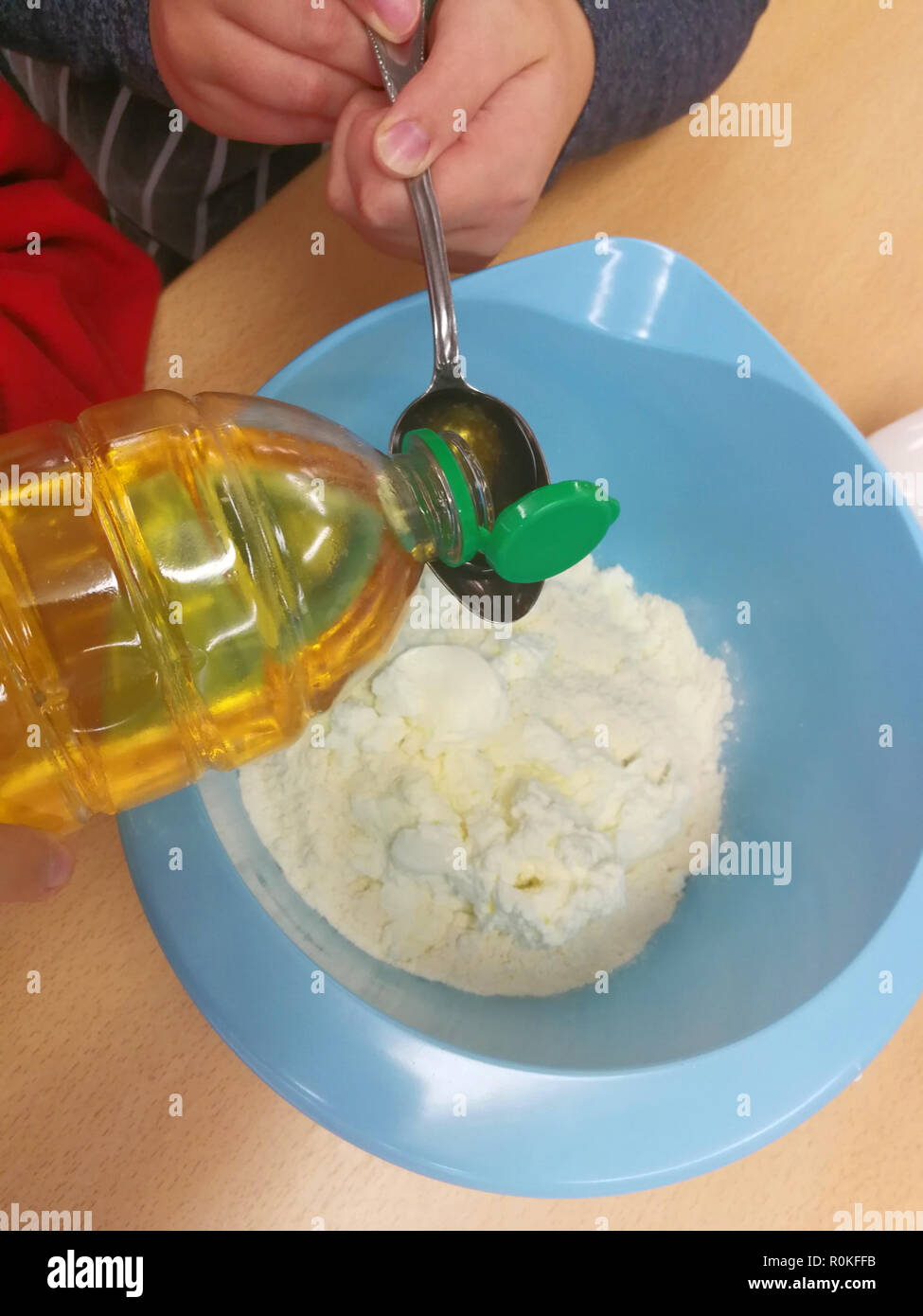 Children hands are baking Stock Photo - Alamy
