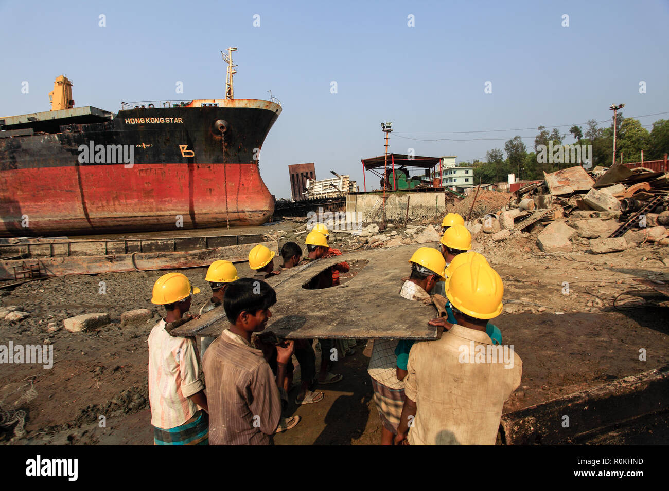 Labourers work at ship- breaking yard. Bangladesh is dependent on ship ...
