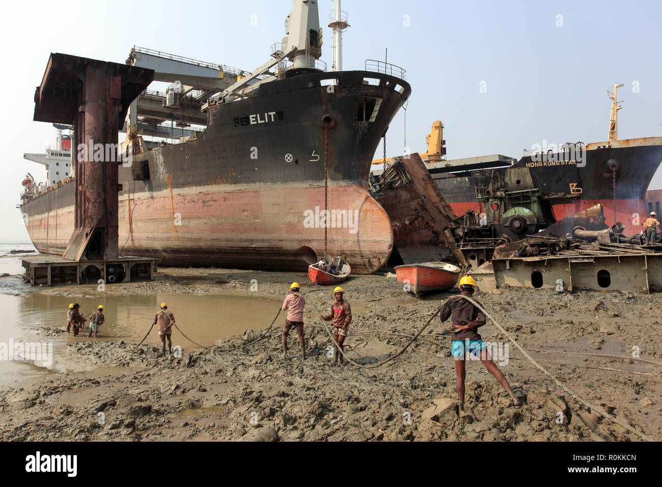 Labourers work at ship- breaking yard. Bangladesh is dependent on ship ...