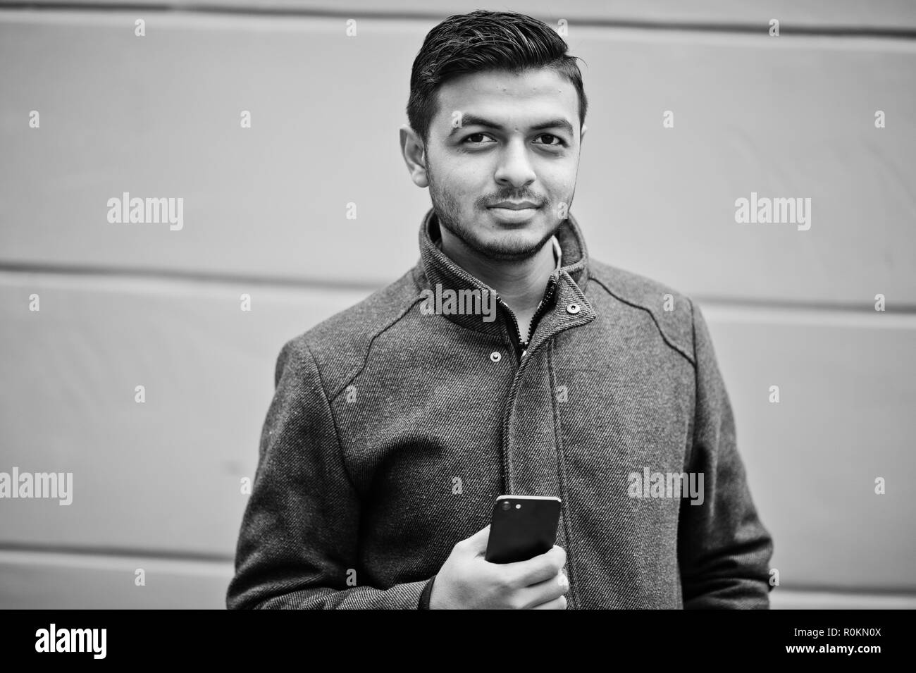 Indian man on cell phone Black and White Stock Photos & Images - Alamy