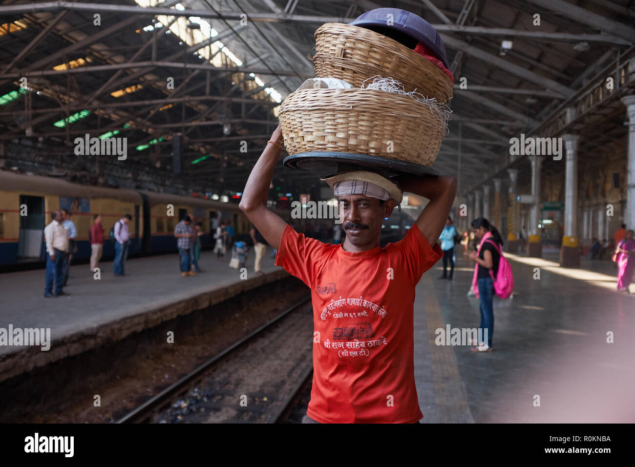 A porter at Chhatrapati Shivaji Maharaj Terminus (CSMT) in Mumbai ...