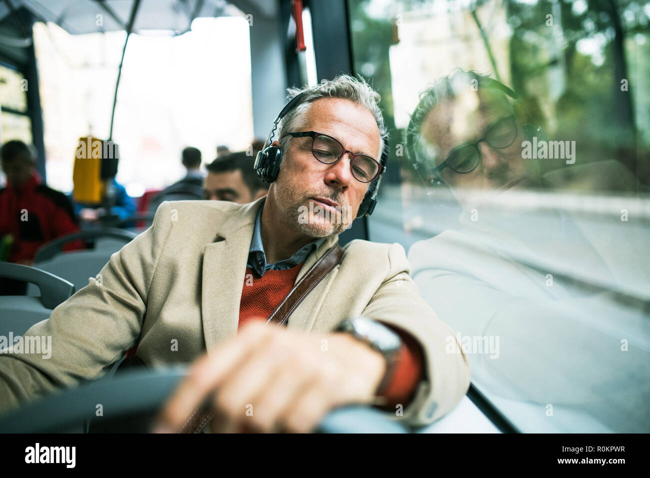Person sleeping bus hi-res stock photography and images - Alamy
