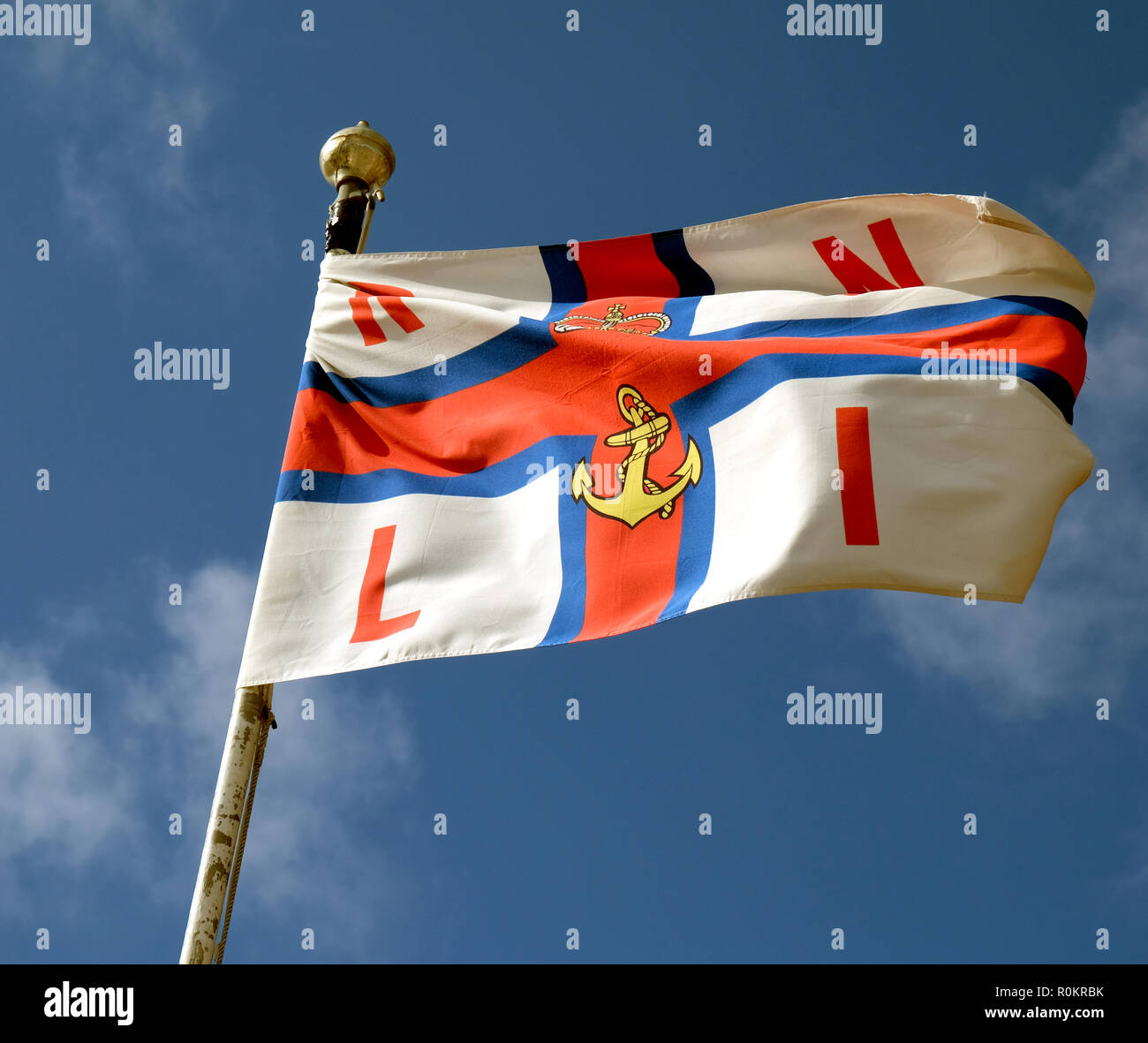 RNLI flag flying over lifeboat station on UK east coast Stock Photo - Alamy