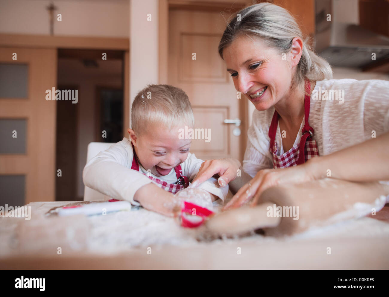 Happy mother child rolling down hi-res stock photography and images - Alamy