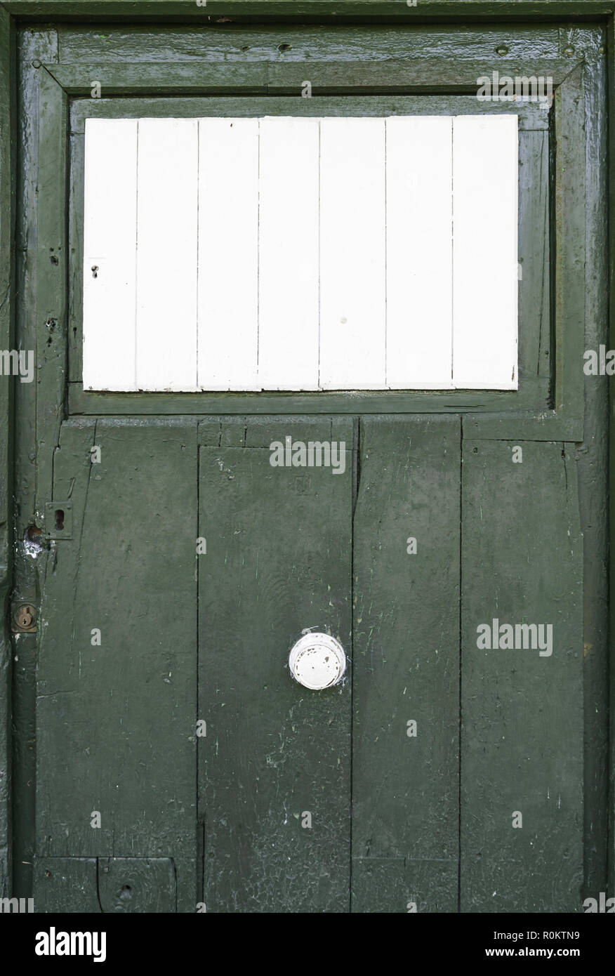 Green wooden door, white, detail of an old country door, antique wooden ...