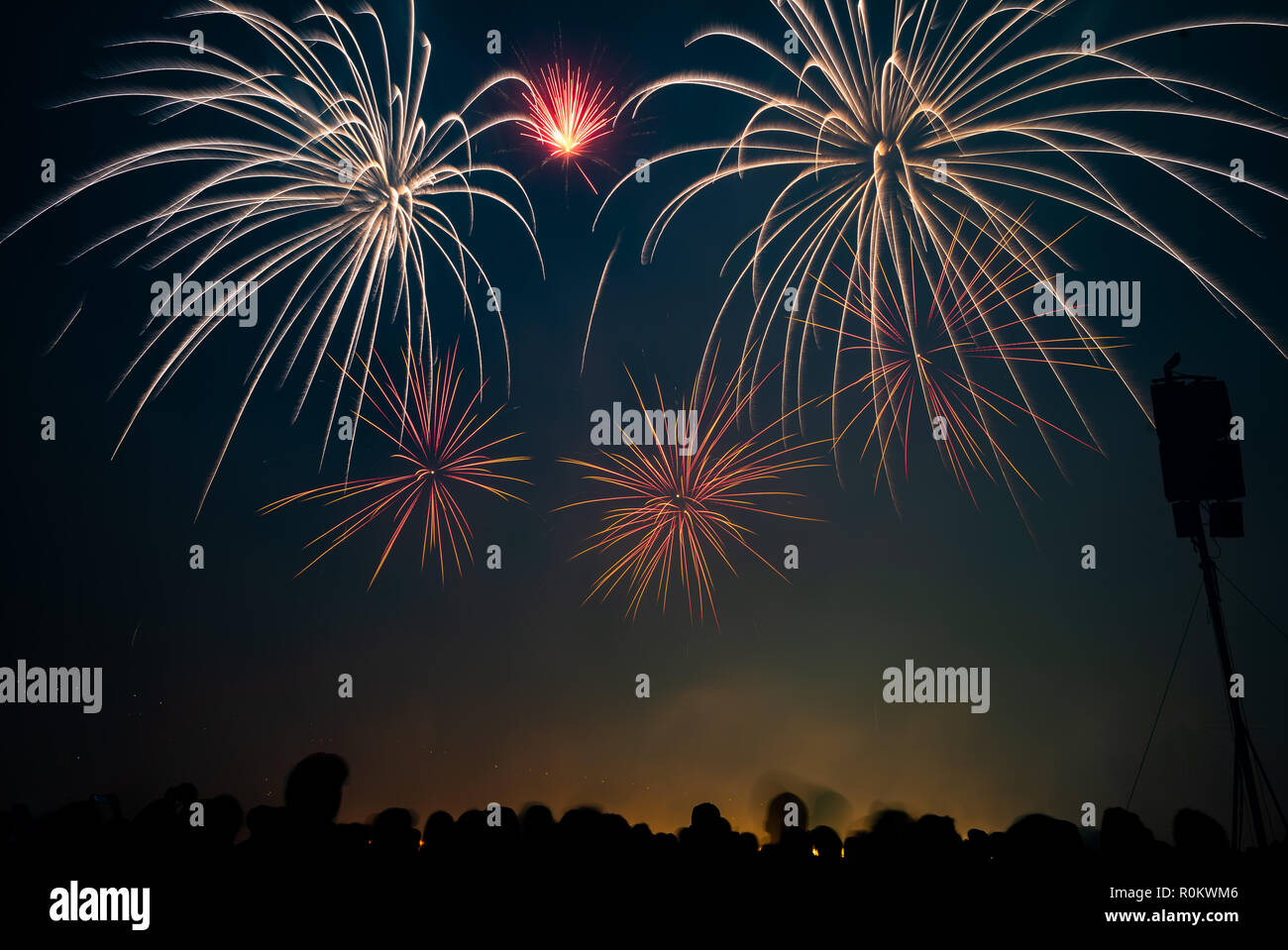 Explosion of firecrackers in the night sky Stock Photo - Alamy