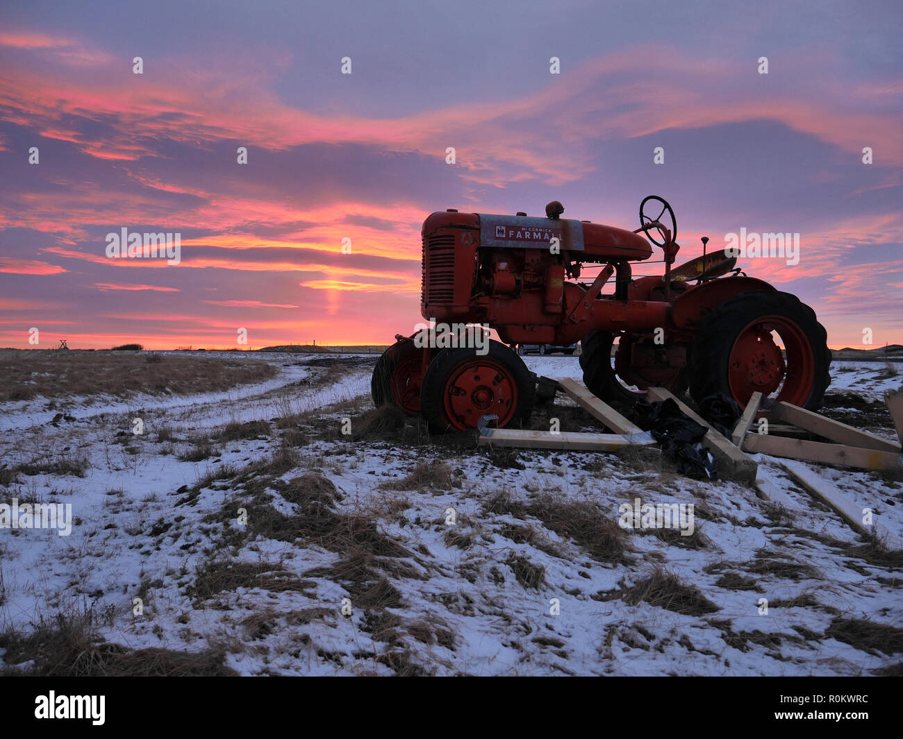 Snow covered tractor hi-res stock photography and images - Alamy