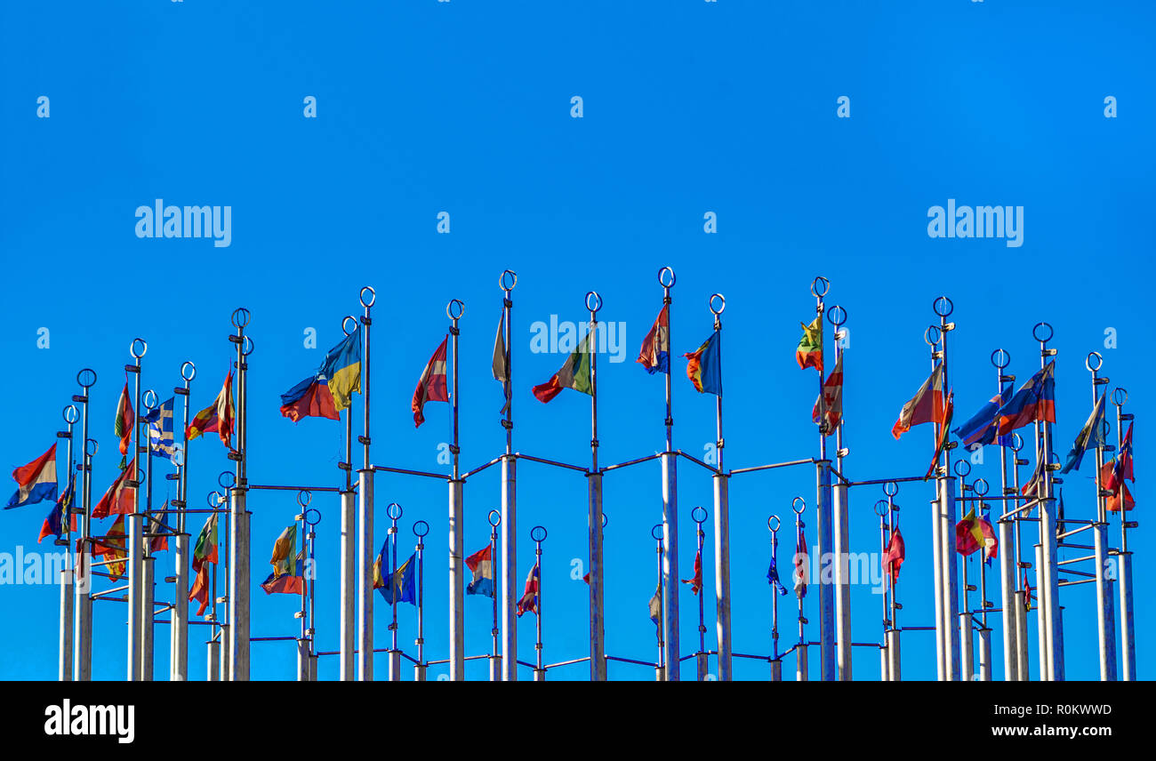 Flags of European countries on flagpoles against the blue sky Stock ...