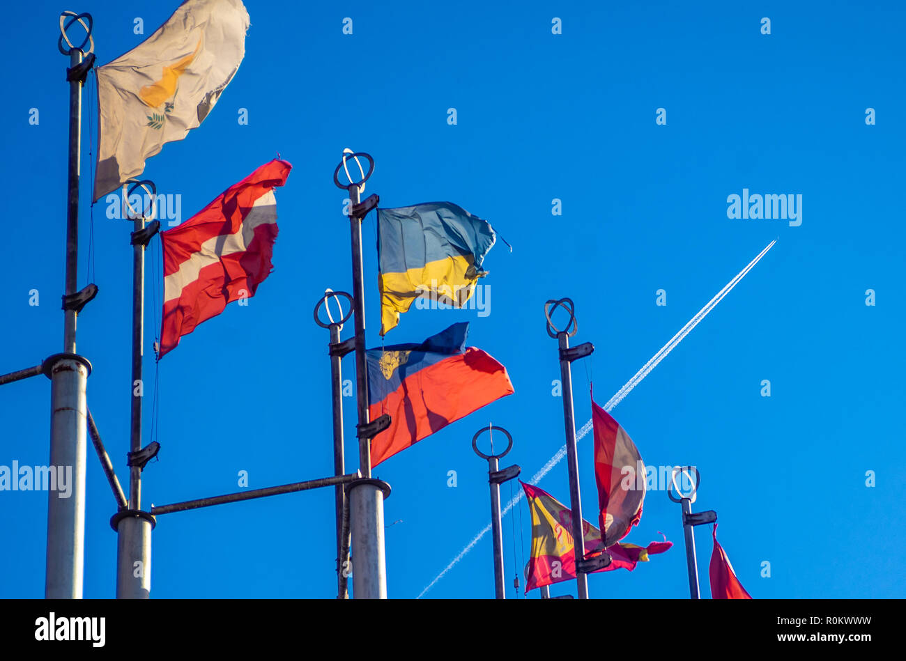 Flags of European countries on flagpoles against the blue sky Stock ...
