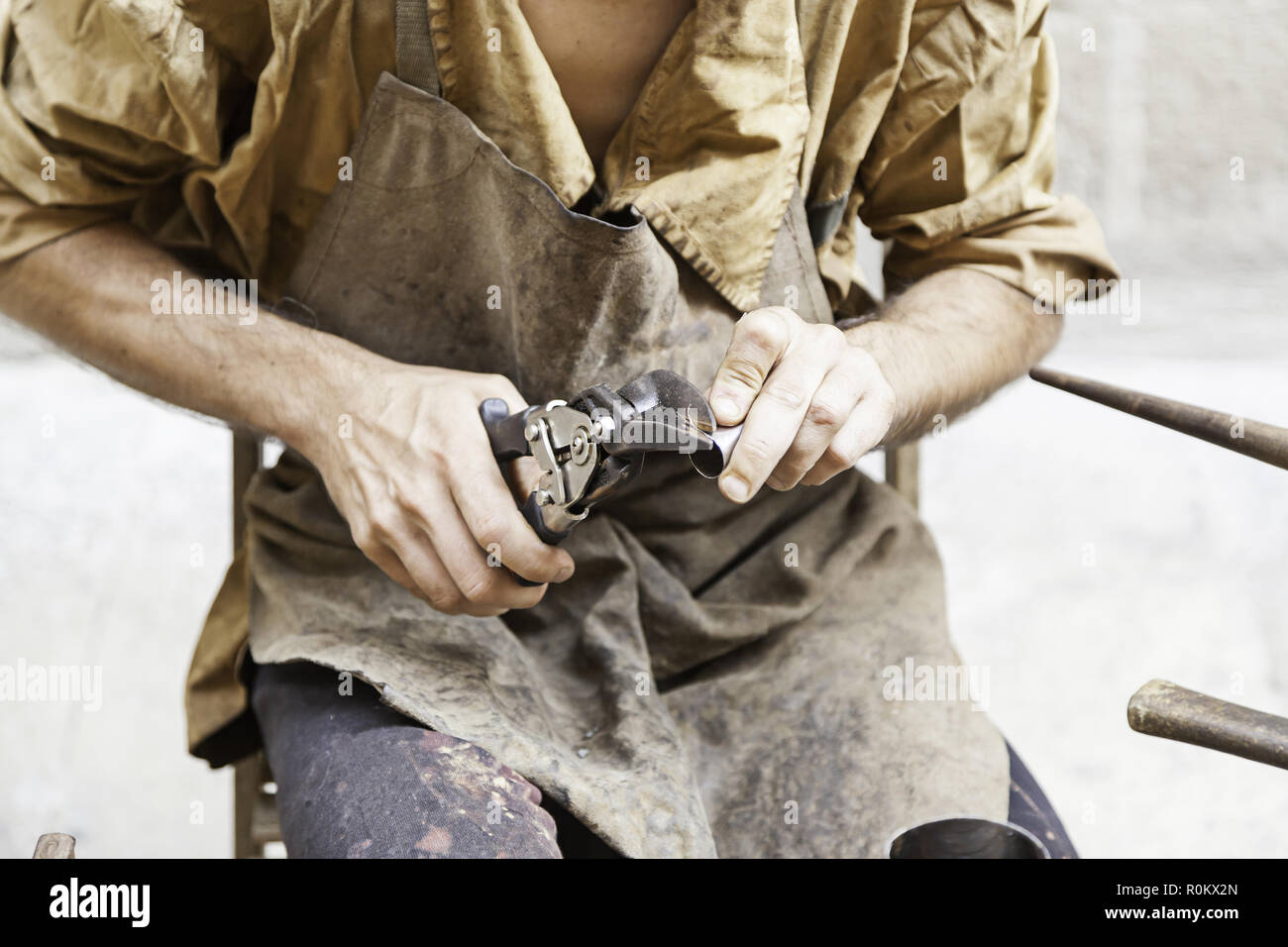 Worker metal craftsman, an artisan detail, tradition and old work Stock ...