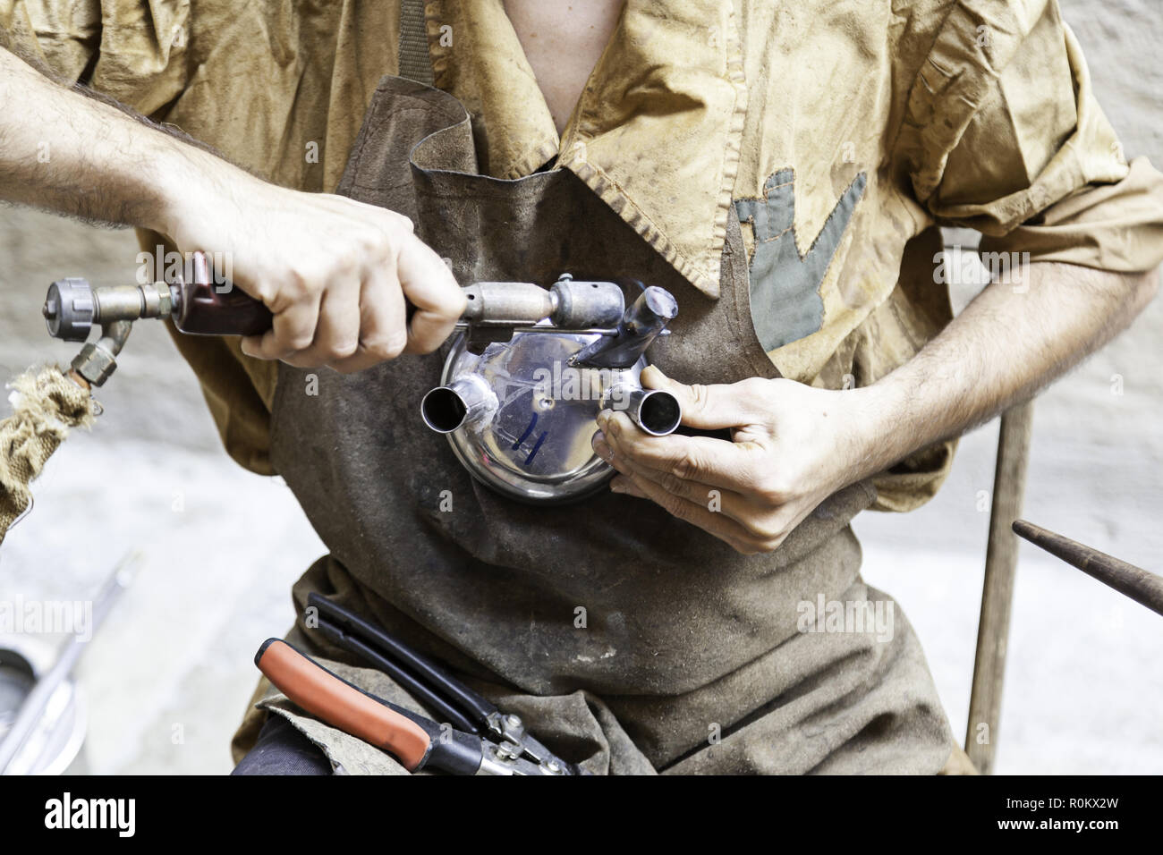 Worker metal craftsman, an artisan detail, tradition and old work Stock ...