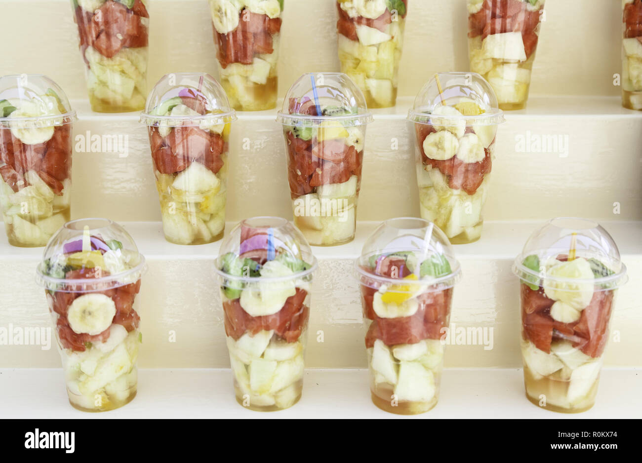 Glasses with cut fruits, detail of some glasses with fresh fruits ...