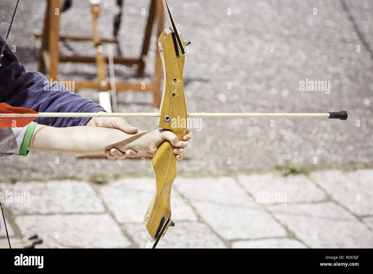 Archer shooting, detail of a person shooting arrows with a bow Stock ...