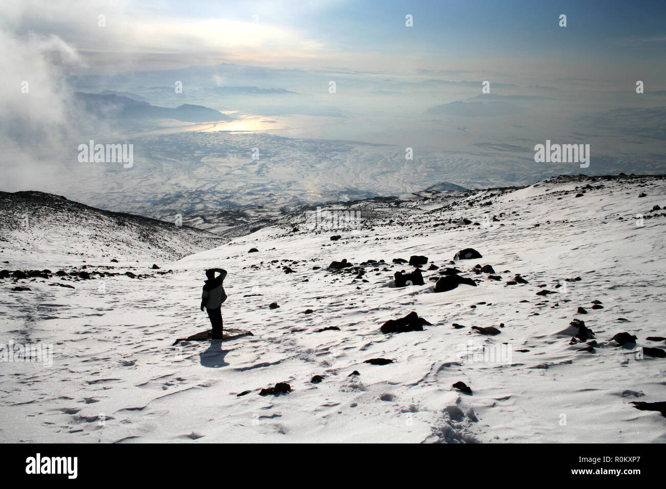 Mountaineer is watching the view of Igdir plain, from Mount Agri ...